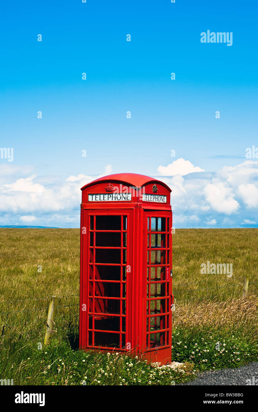 Red phone booth standing alone hi-res stock photography and images - Alamy