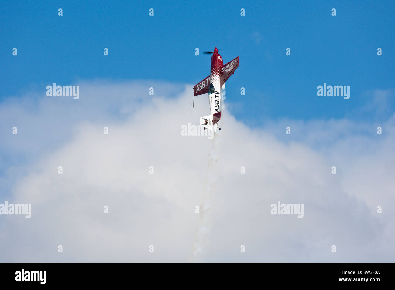 Mike Goulian performing in his Extra 300 SC during an air show at NAS ...