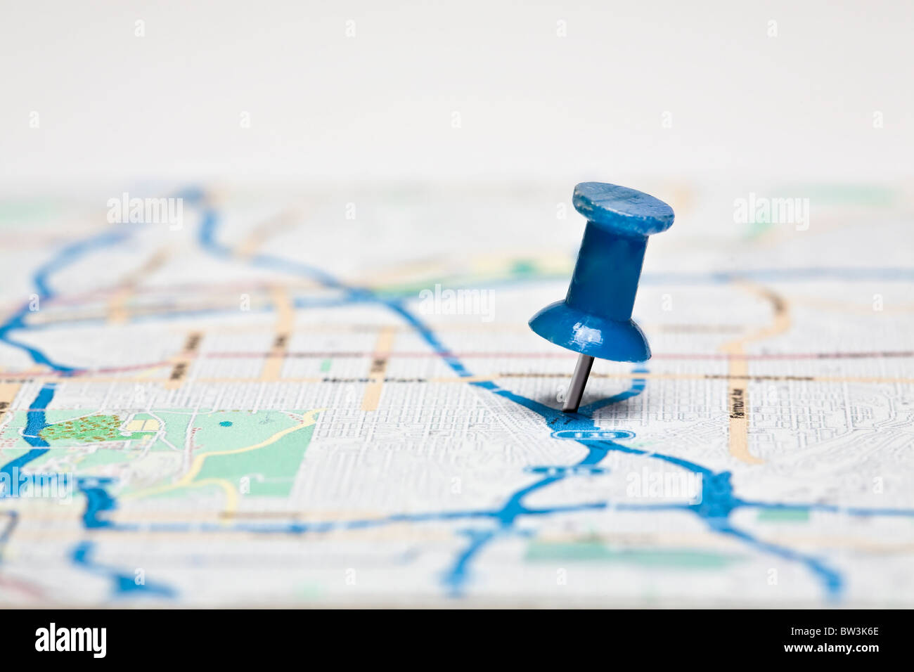 push pin in colorful map Stock Photo - Alamy