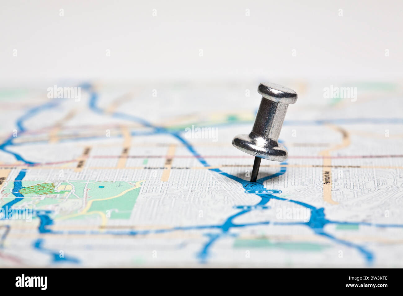 push pin in colorful map Stock Photo - Alamy