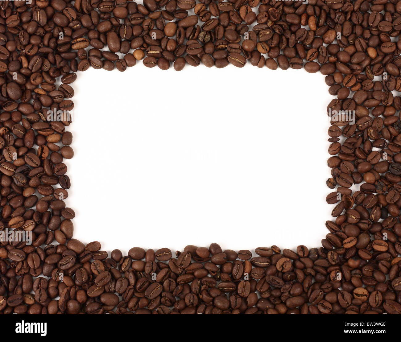 Frame of delicious coffee beans on white background Stock Photo - Alamy