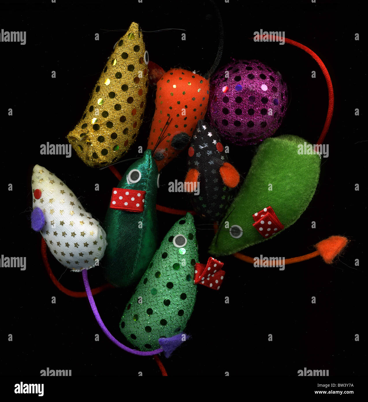 Toy mice gather in front of a black backdrop Stock Photo - Alamy