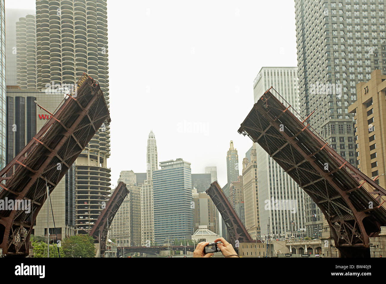 Camera photographing raised bridges along Chicago River, Chicago ...