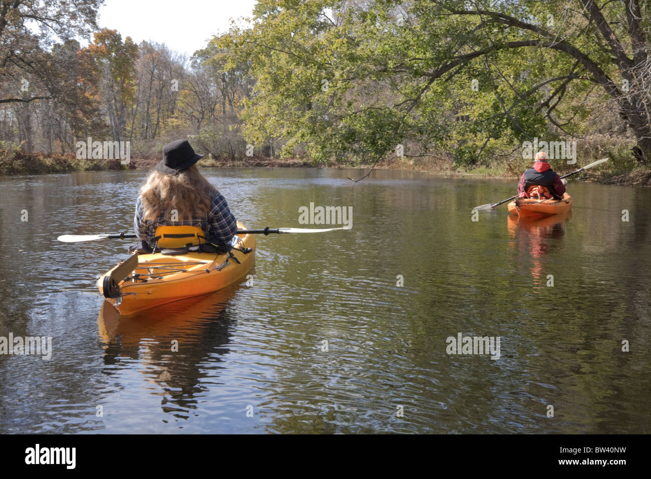 Two mature women kayaking, Moira River, Hastings County, Ontario ...