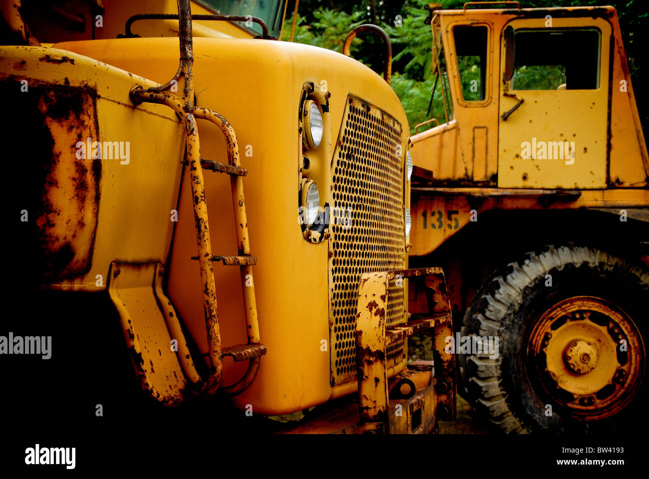 Big mining dump trucks heavy machinery, very rusted and rusty with ...