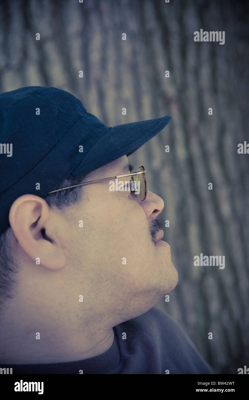 Man, age 36, wearing glasses and a hat Stock Photo - Alamy