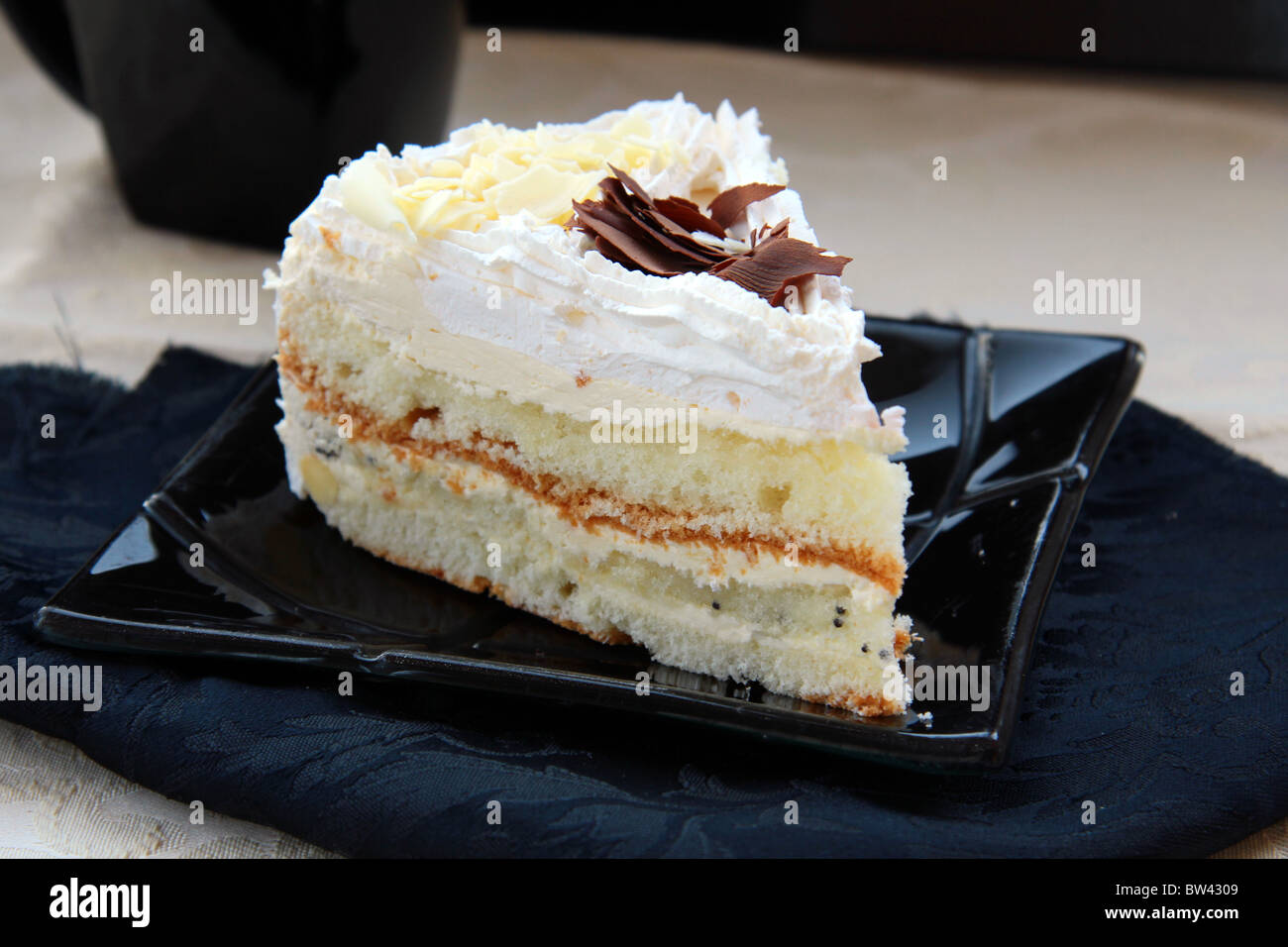 Pretty tasty cake on a beautiful plate Stock Photo - Alamy