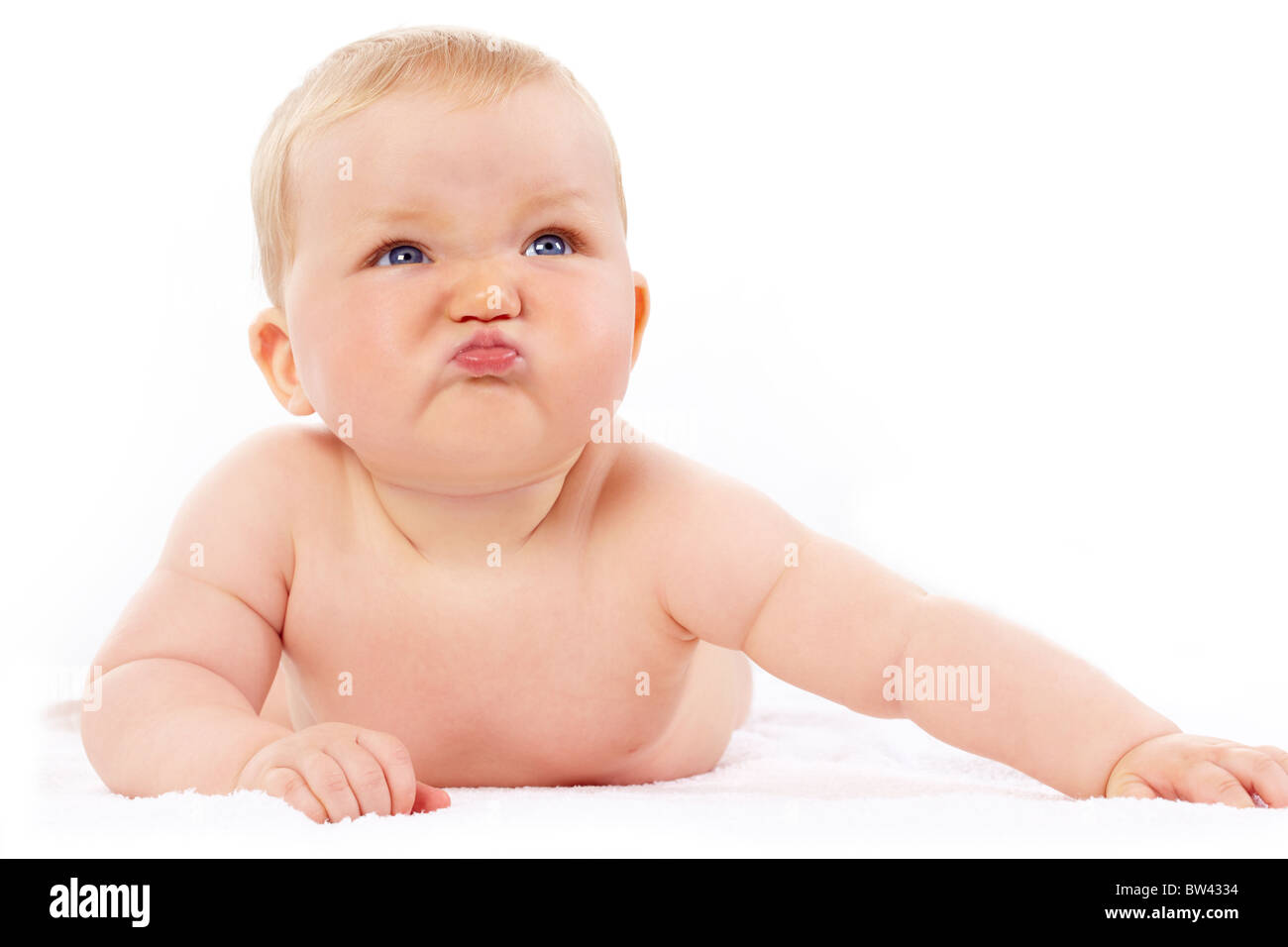 Portrait of small girl with capricious expression looking upwards Stock ...
