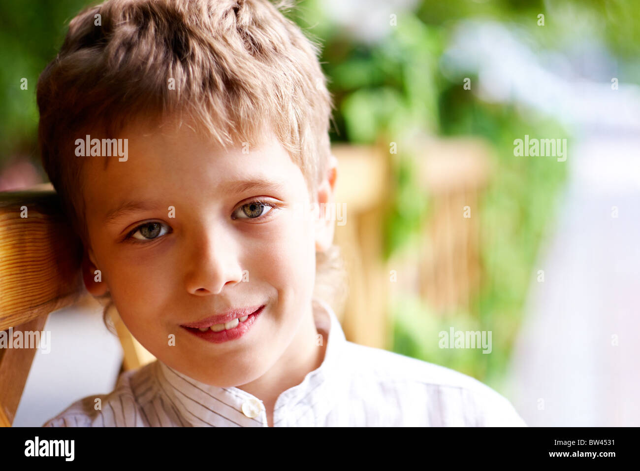 Portrait of handsome boy looking at camera Stock Photo - Alamy