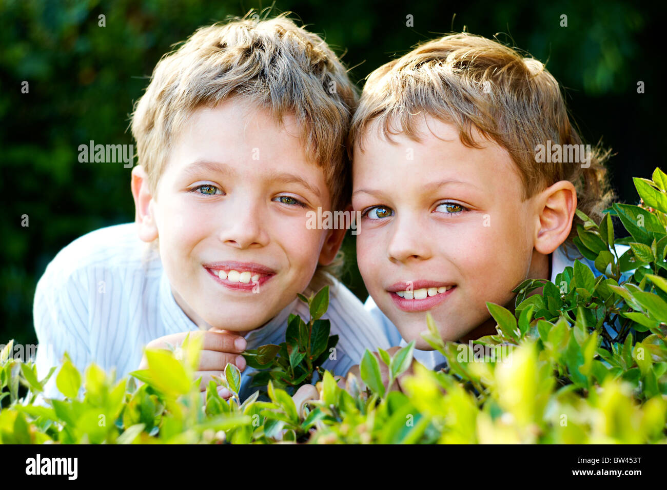 Portrait of happy friends smiling at camera Stock Photo - Alamy
