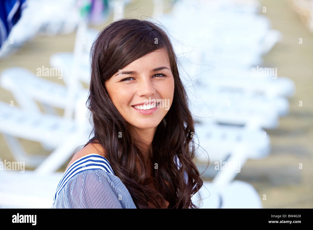 Portrait of pretty young lady looking at camera Stock Photo - Alamy