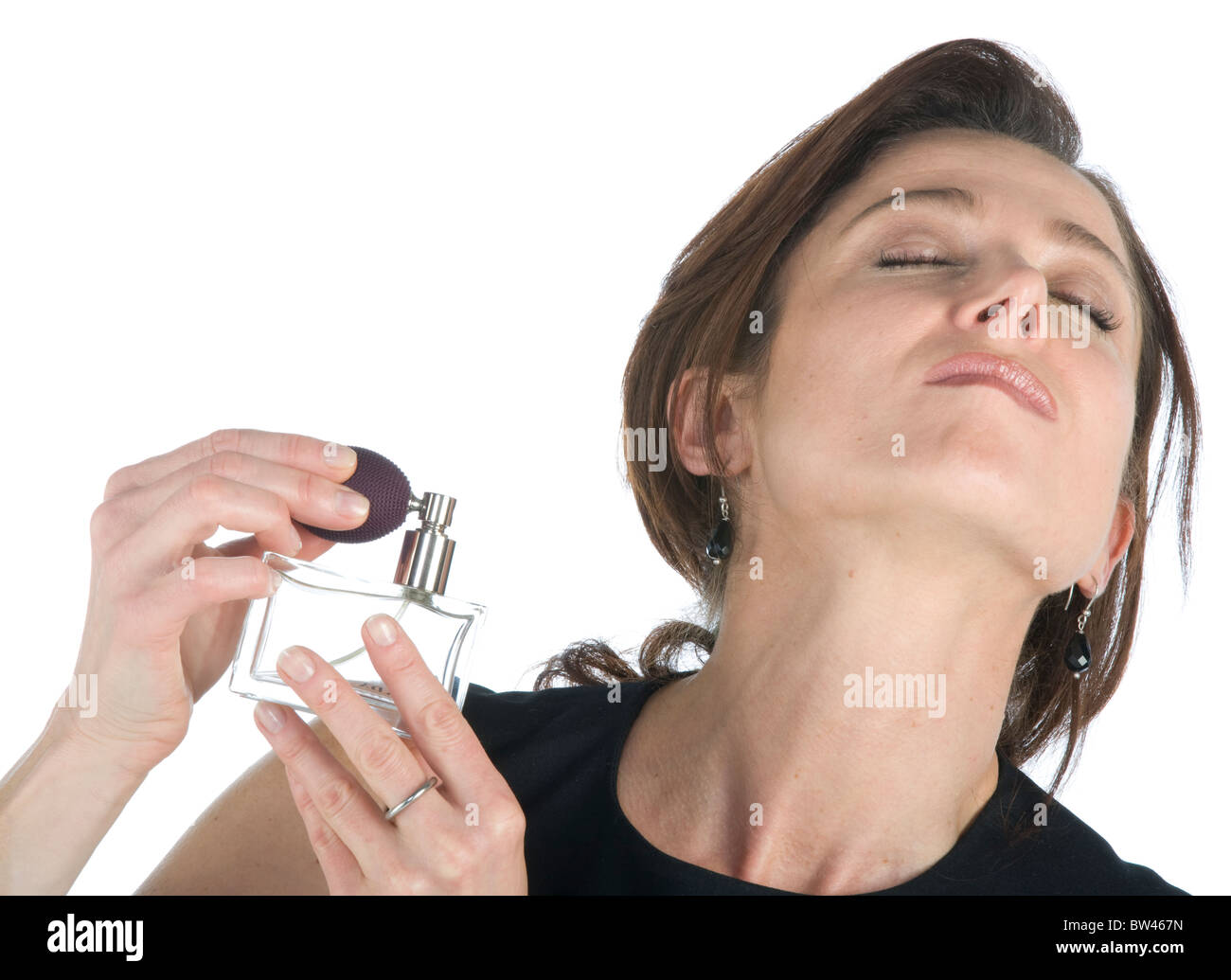 woman applying perfume Stock Photo - Alamy