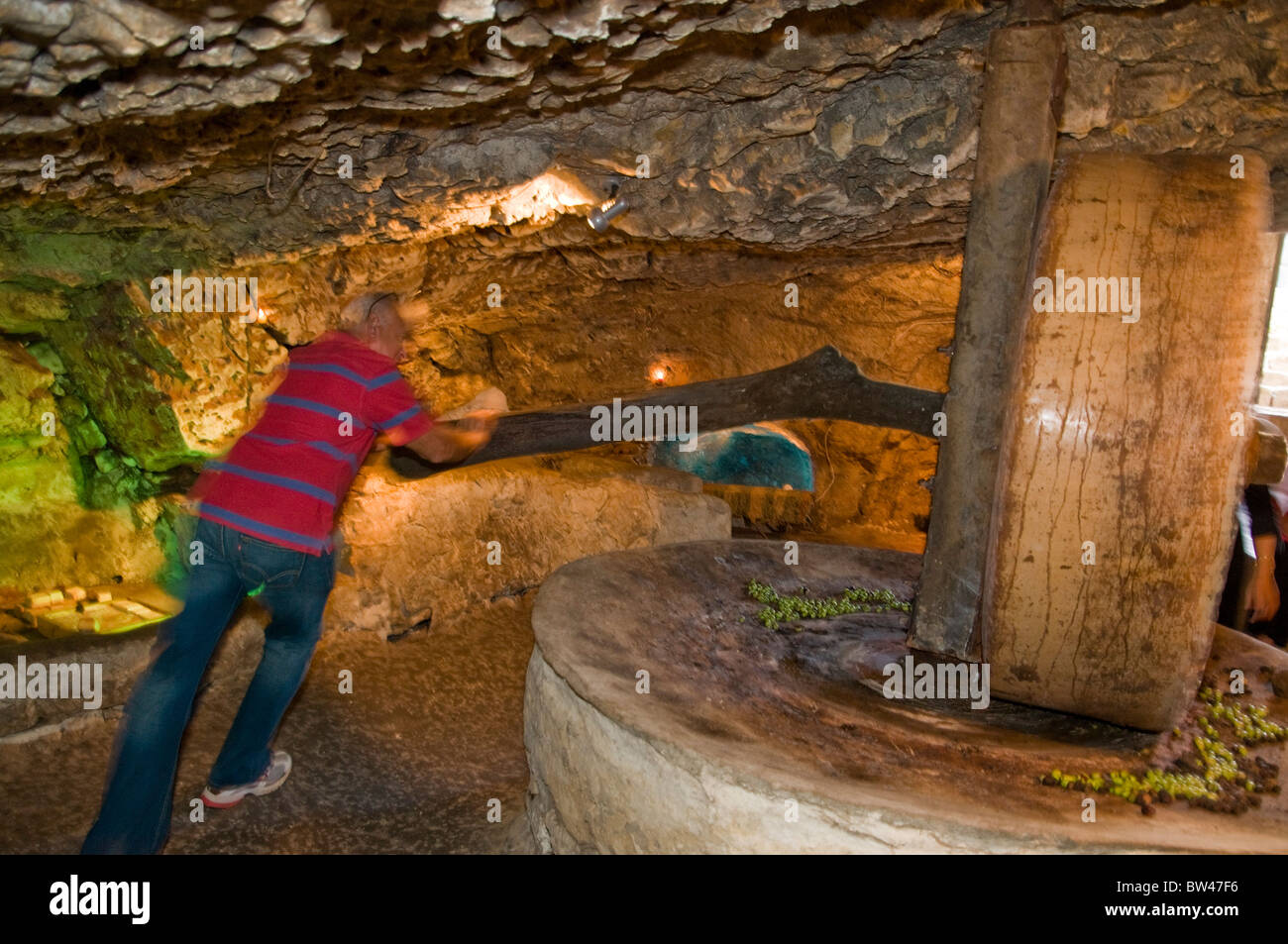 An Olive Oil stone press in a natural cave Stock Photo - Alamy