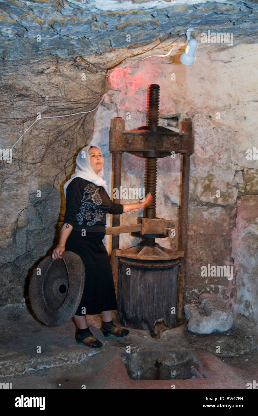 An Olive Oil stone press in a natural cave Stock Photo - Alamy