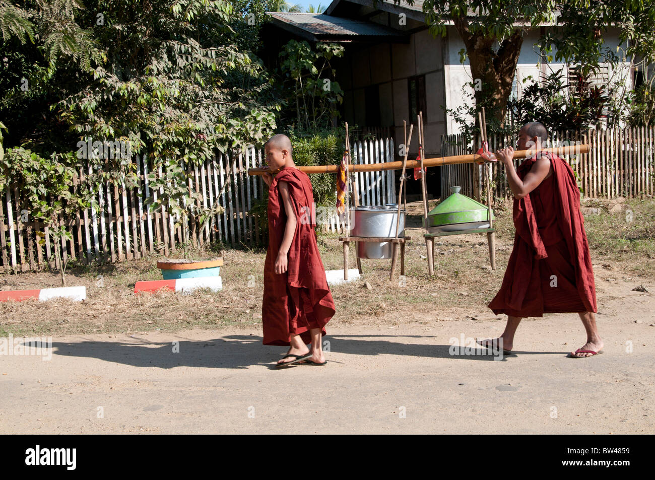 MYANMAR (BURMA) BUDDHIST MONKS TAKING FOOD GIVEN BY PEOPLE TO THEIR ...