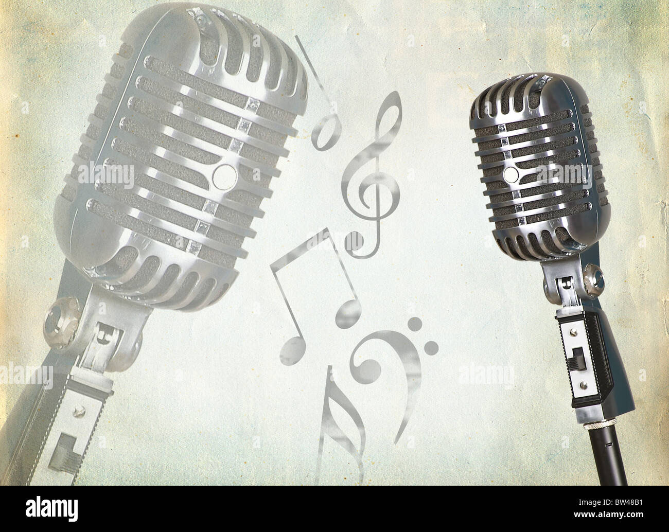 Retro microphone on paper background Stock Photo - Alamy