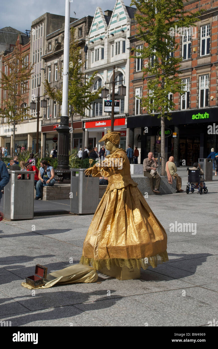 A female silent street performer in Long Row Nottingham Stock Photo - Alamy