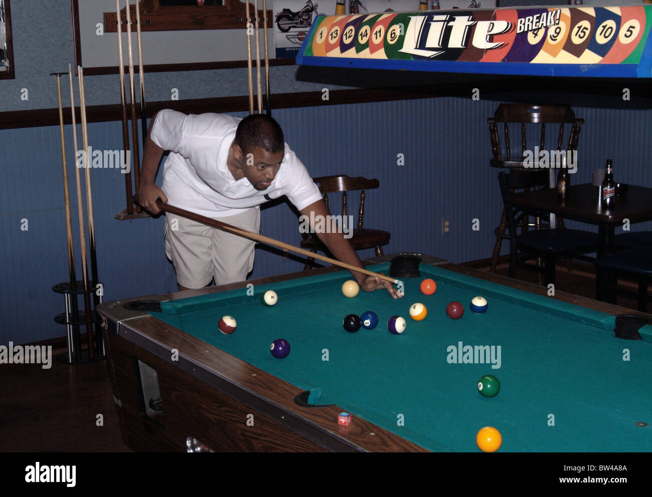 Man playing pool Stock Photo - Alamy