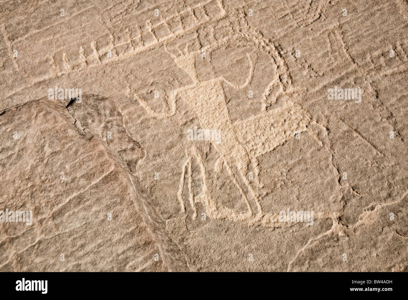 Rock-art of man and boat in the Eastern Desert of Egypt, North North ...