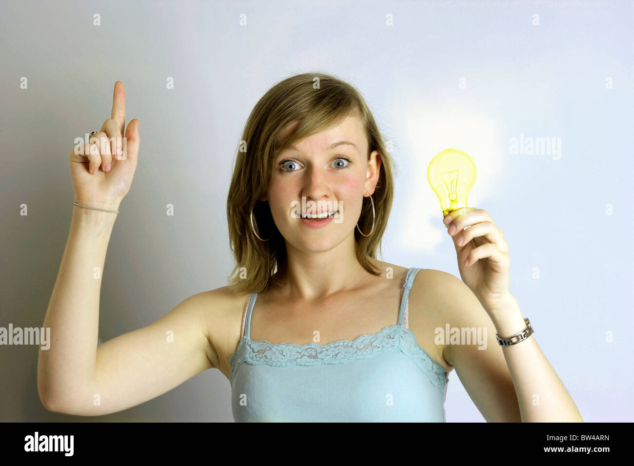 bright idea, new idea, spark, etc. Expressions of a young woman Stock ...