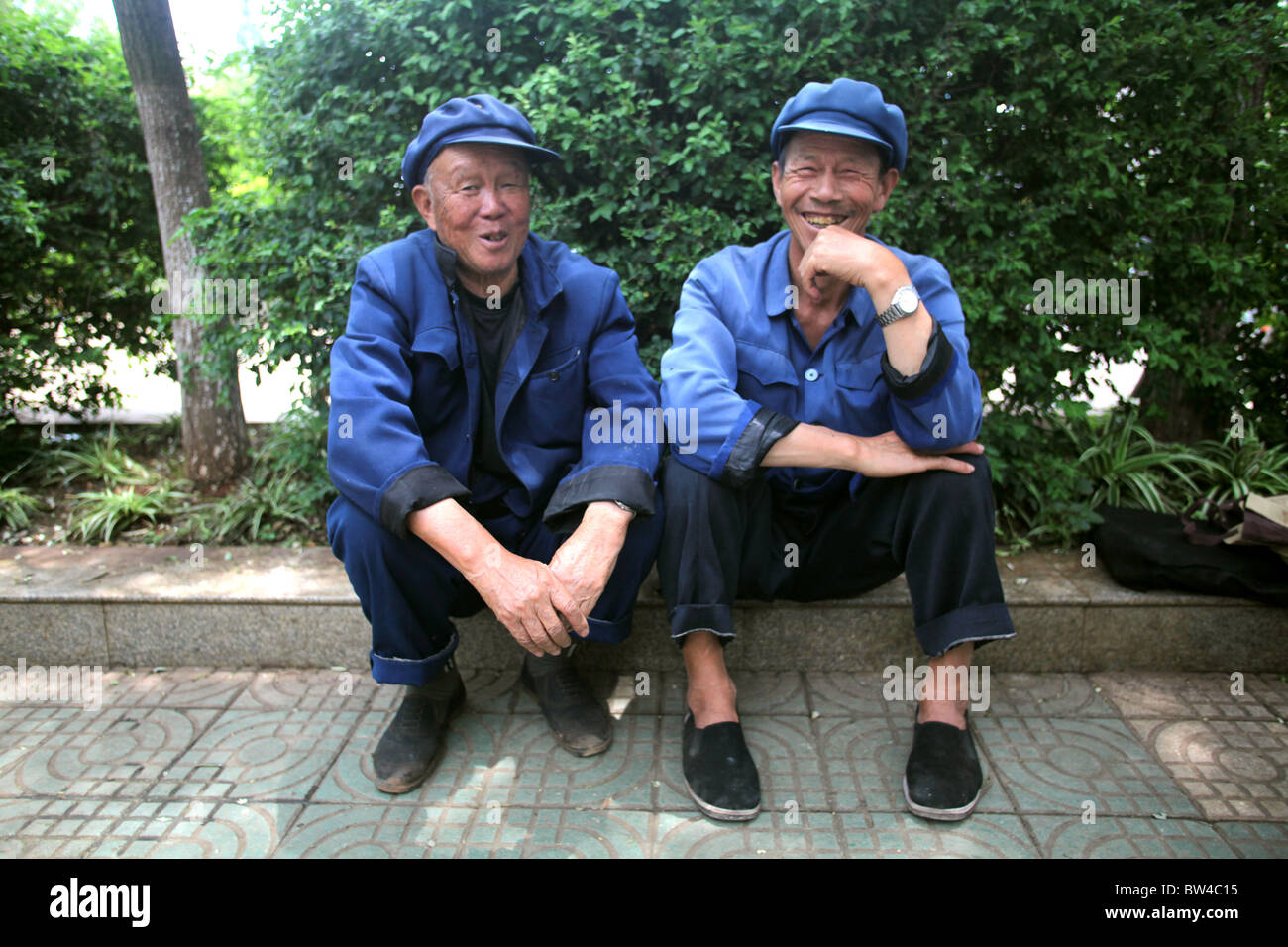 Local men dressed in the style of chairman mao in Green Park, central ...