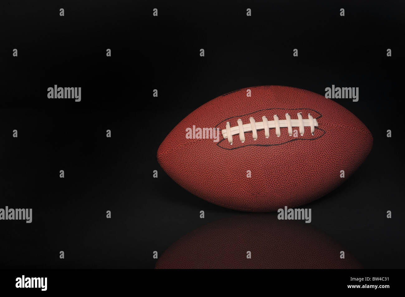 American Football on black background ready for your type Stock Photo ...