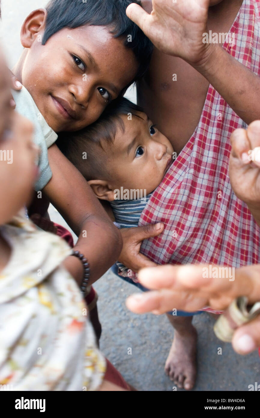 Hungry street children are in need of food on the streets of Kampong ...