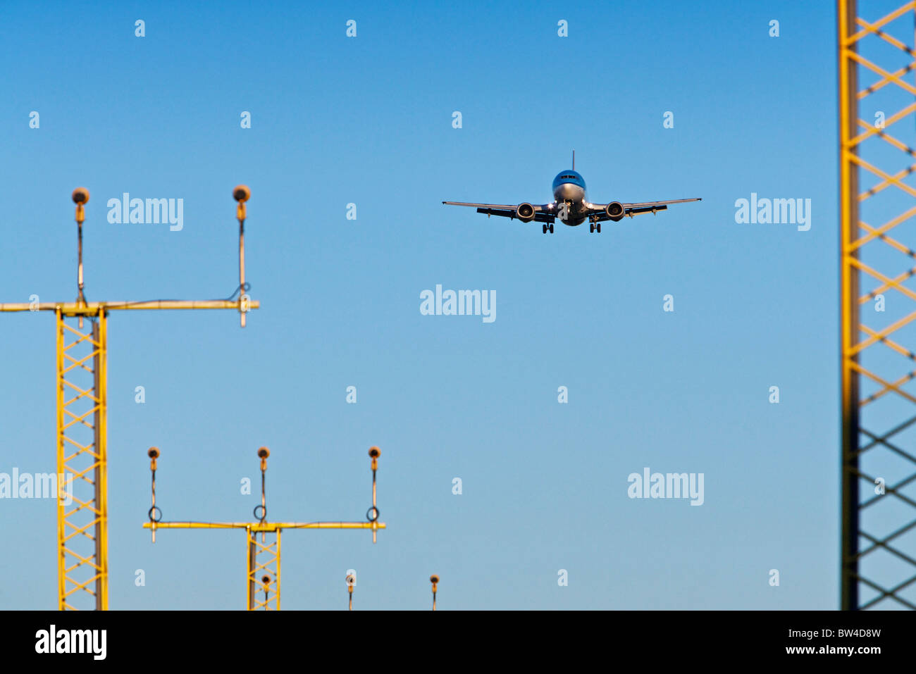 A plane approaching landing lights at Edinburgh airport Stock Photo - Alamy