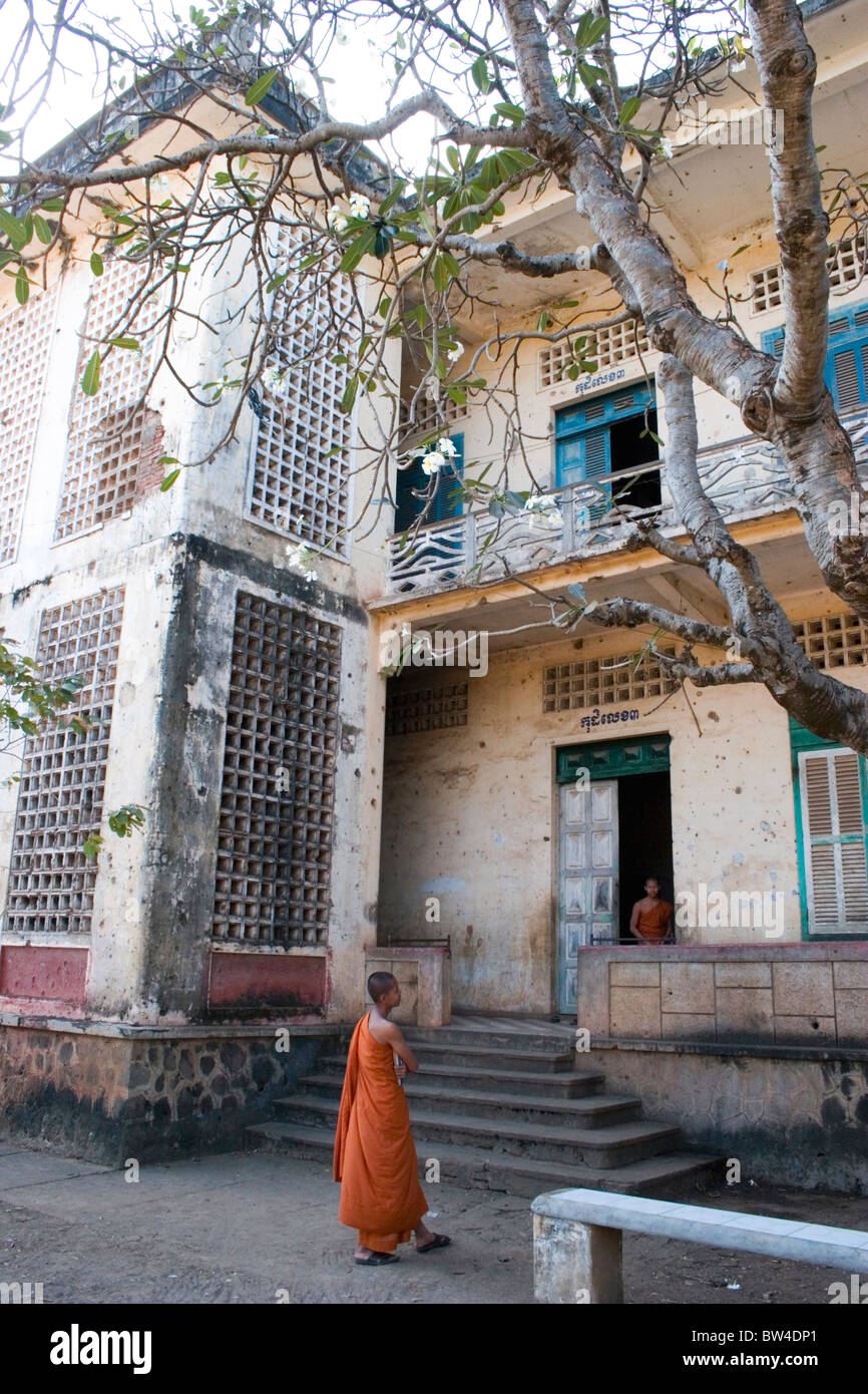 A Buddhist monk who lives at Wat Bangkok is walking in front of his ...