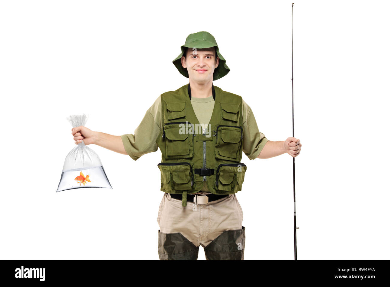 A happy fisherman holding a plastic bag with golden fish Stock Photo ...