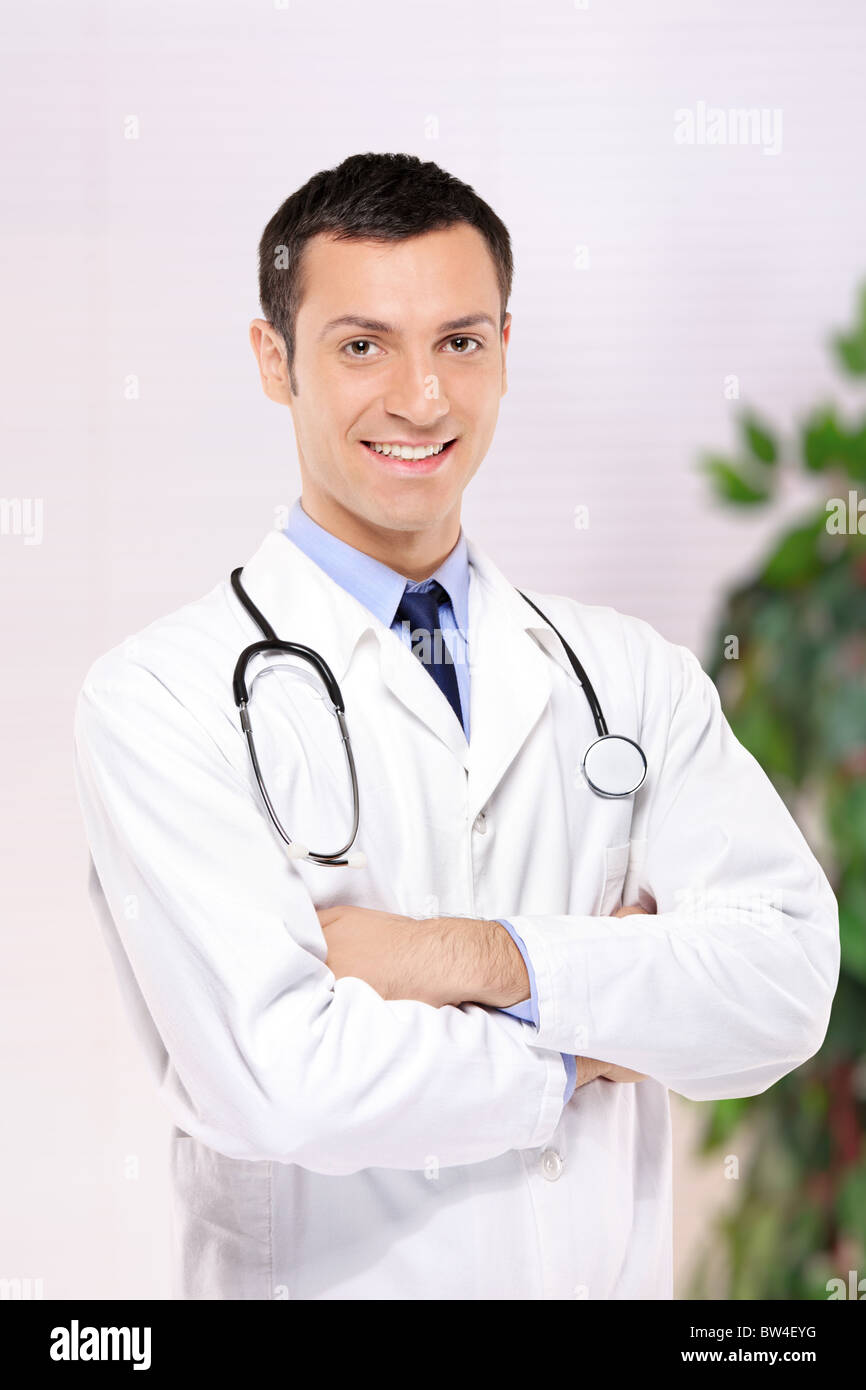 A medical doctor posing in the office Stock Photo - Alamy