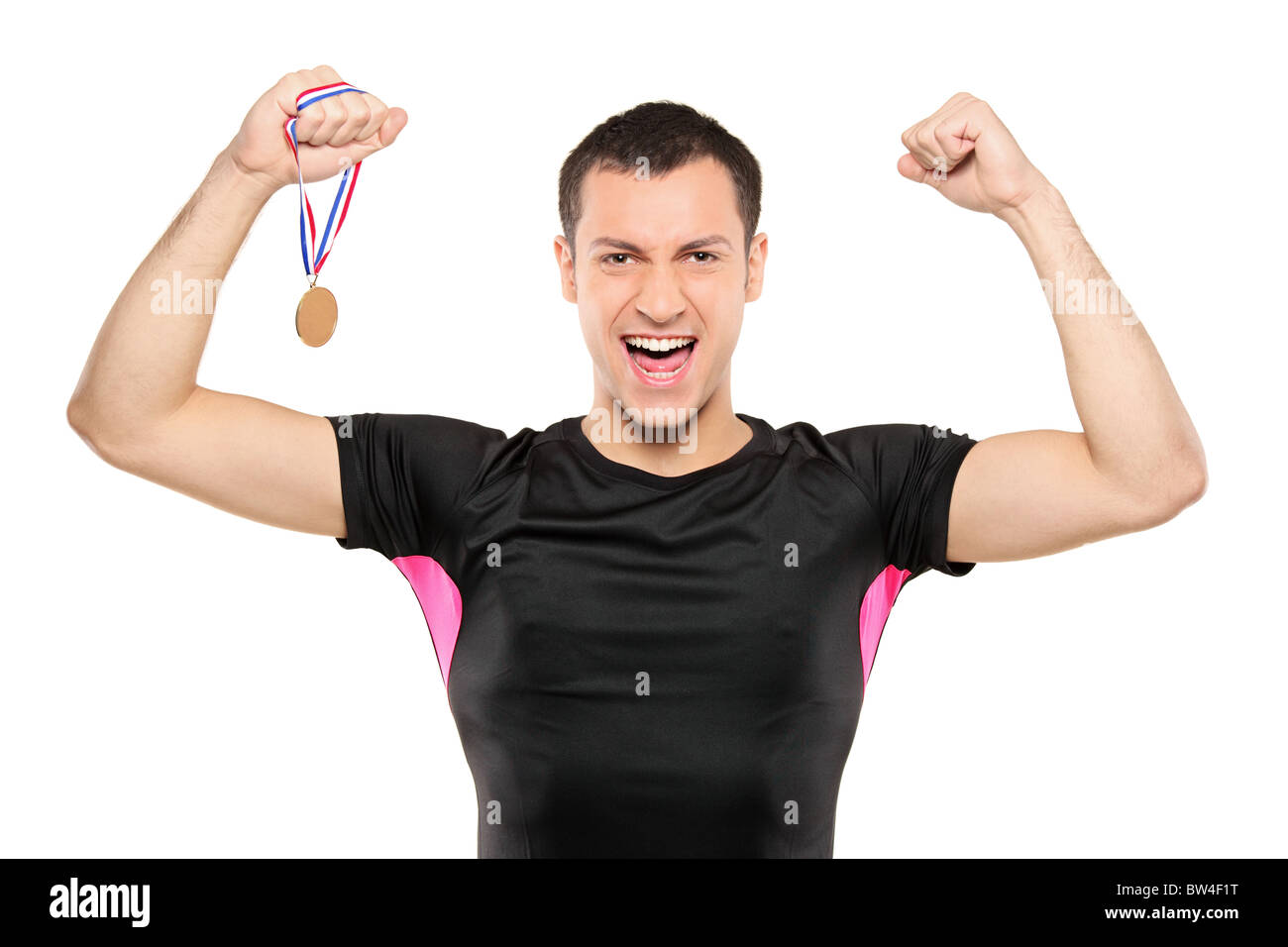 Young happy sportsman holding a gold medal Stock Photo - Alamy