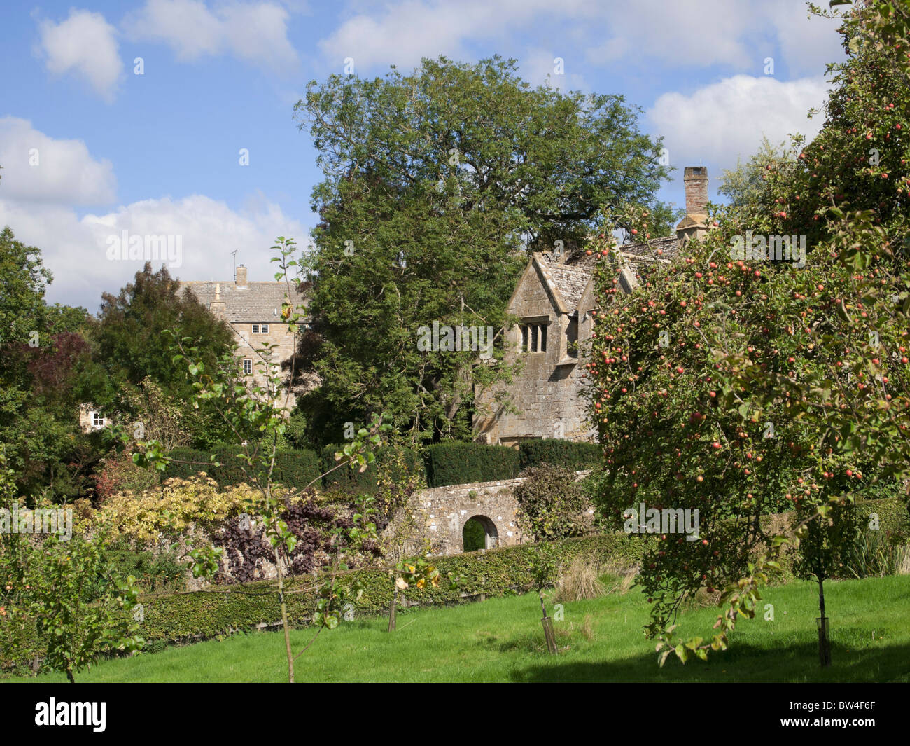 village with houses in countryside - snowshill the cotswolds ...