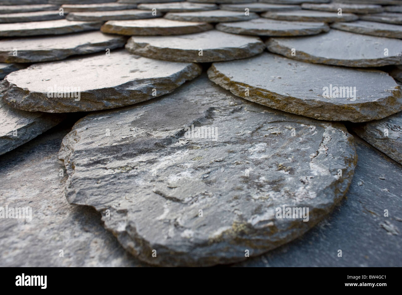Traditional grey schist tile roofing, nice background Stock Photo - Alamy