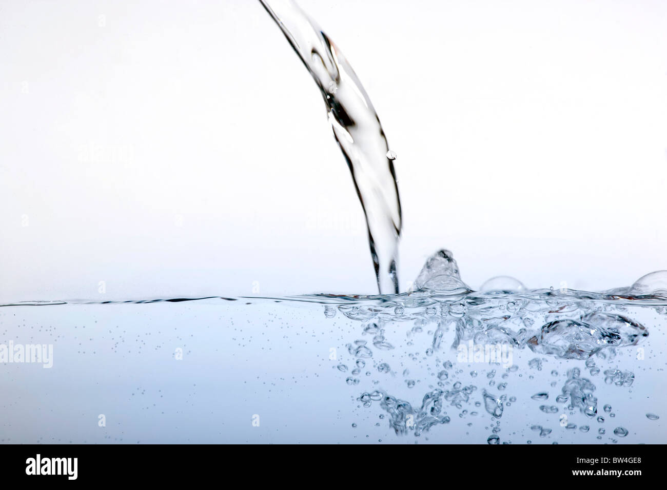Water splash isolated on white Stock Photo - Alamy