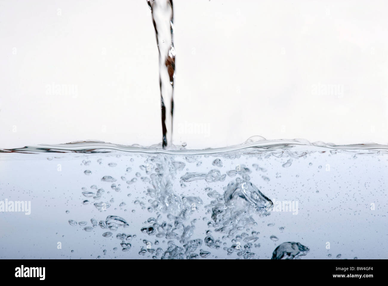 Water splash isolated on white Stock Photo - Alamy