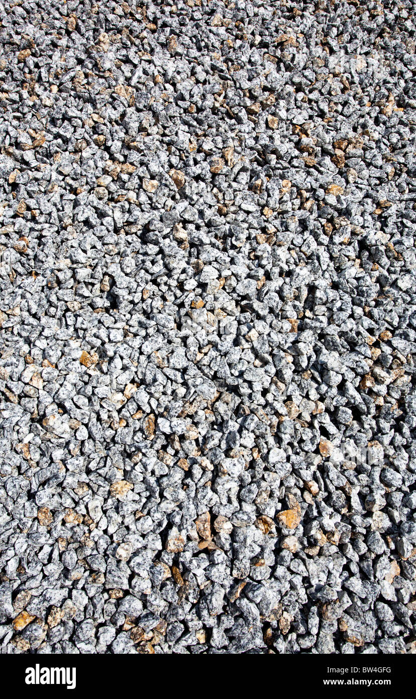 Coarse crushed stones , used for construction , roads and making ...