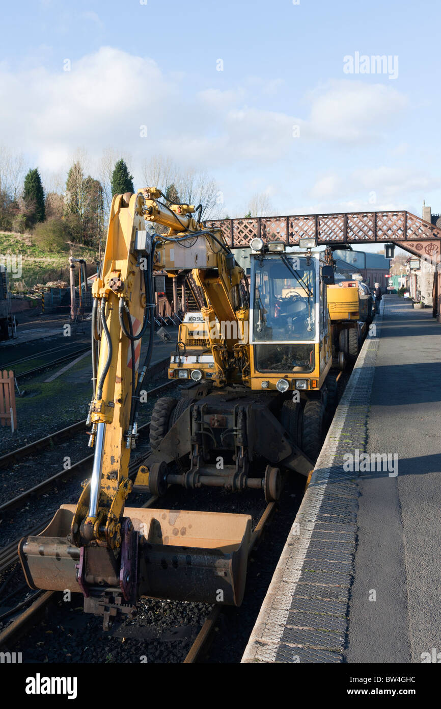 [Excavator fitted with train wheels] to run on "railway tracks Stock ...