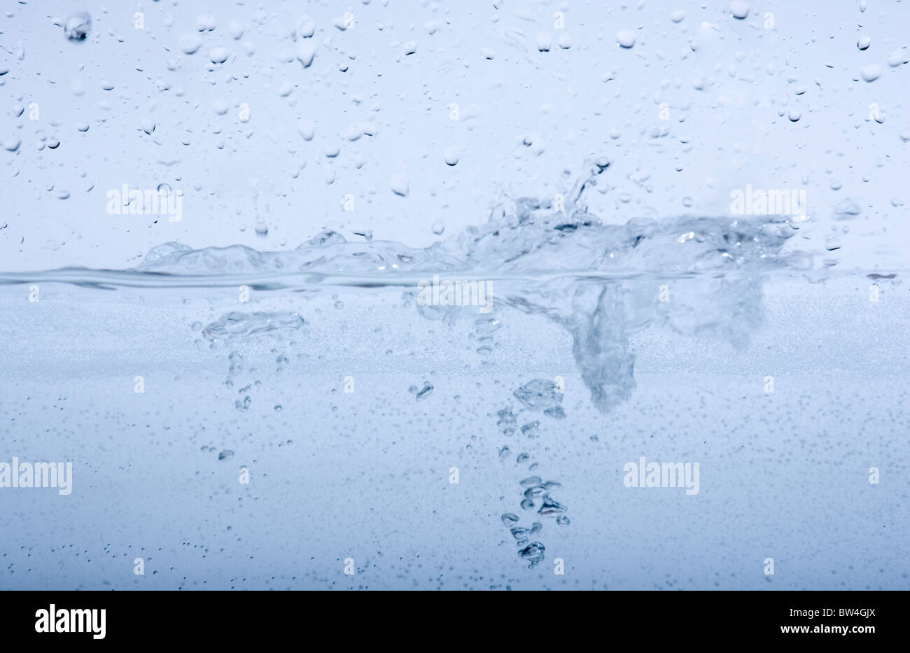 Water splash isolated on white Stock Photo - Alamy