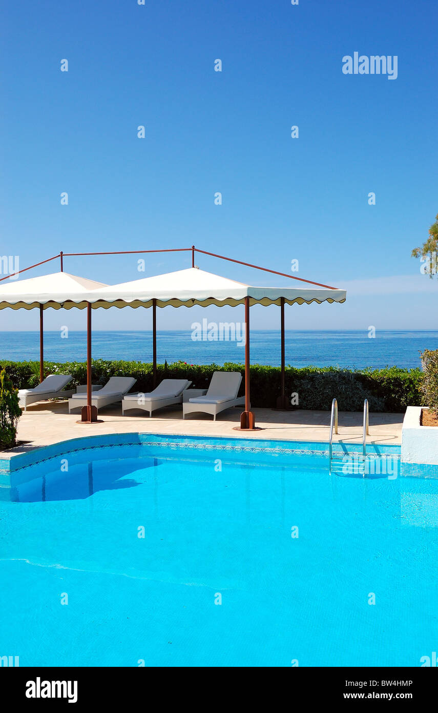 Swimming pool at luxury hotel, Crete, Greece Stock Photo - Alamy