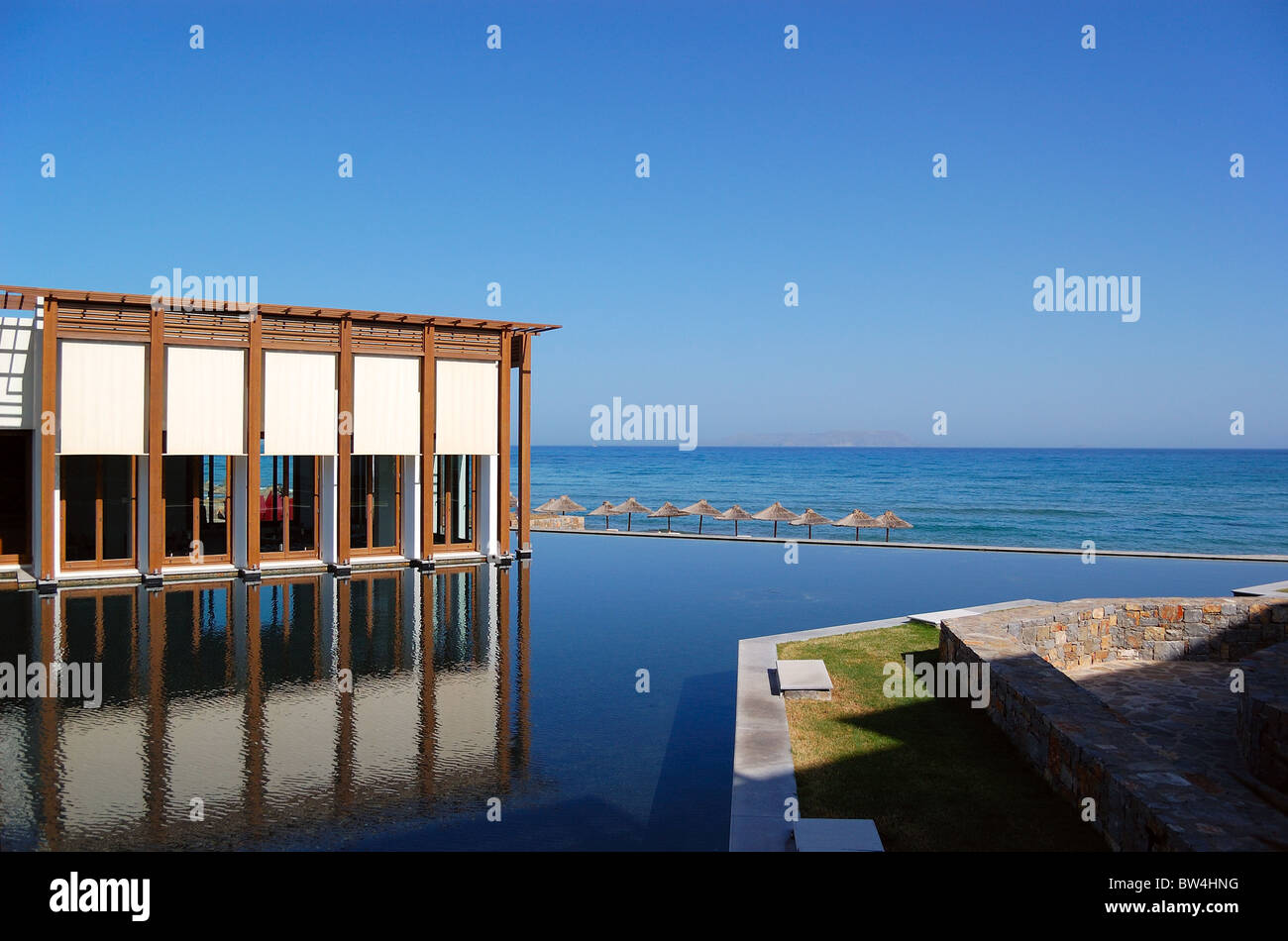 Restaurant, swimming pool and beach of modern luxury hotel, Crete ...