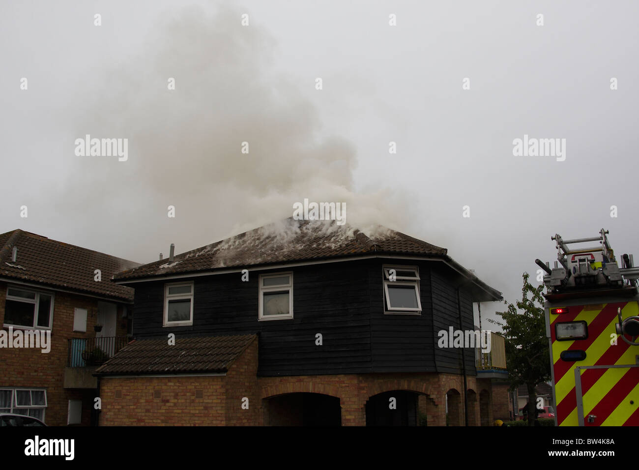 Smoke on roof hi-res stock photography and images - Alamy