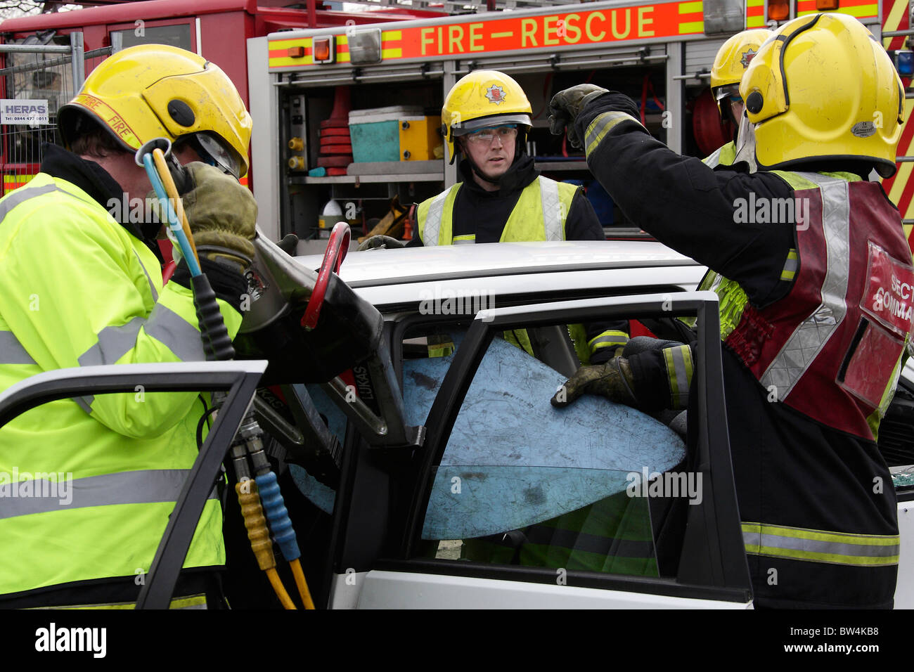 Firefighter using Holmatro rescue tools Stock Photo - Alamy
