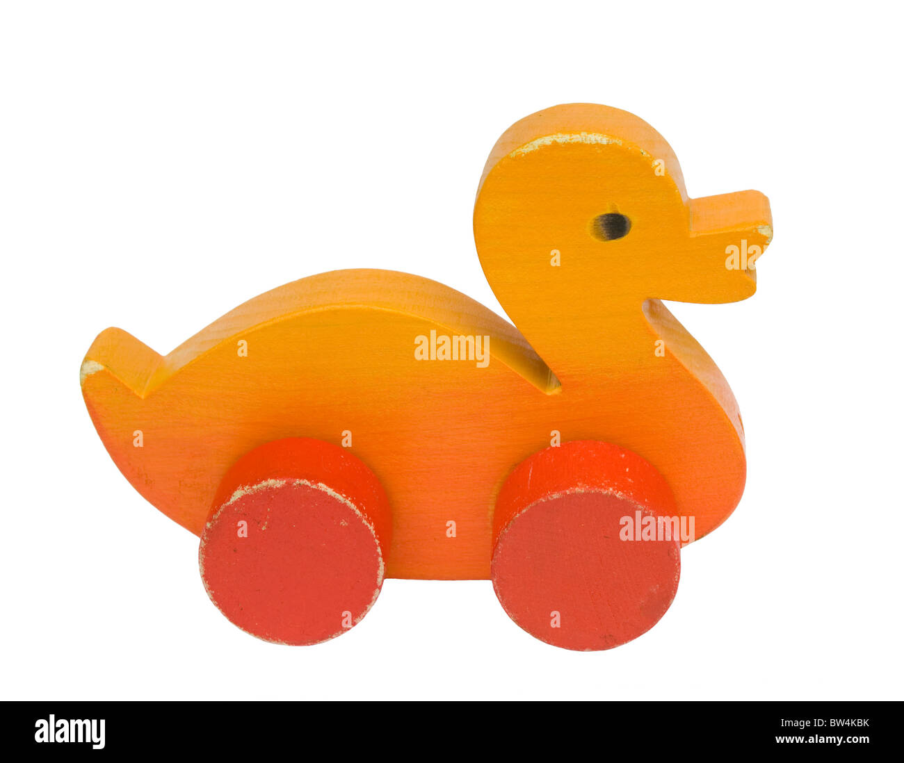 Old wooden toy duck on white background Stock Photo - Alamy