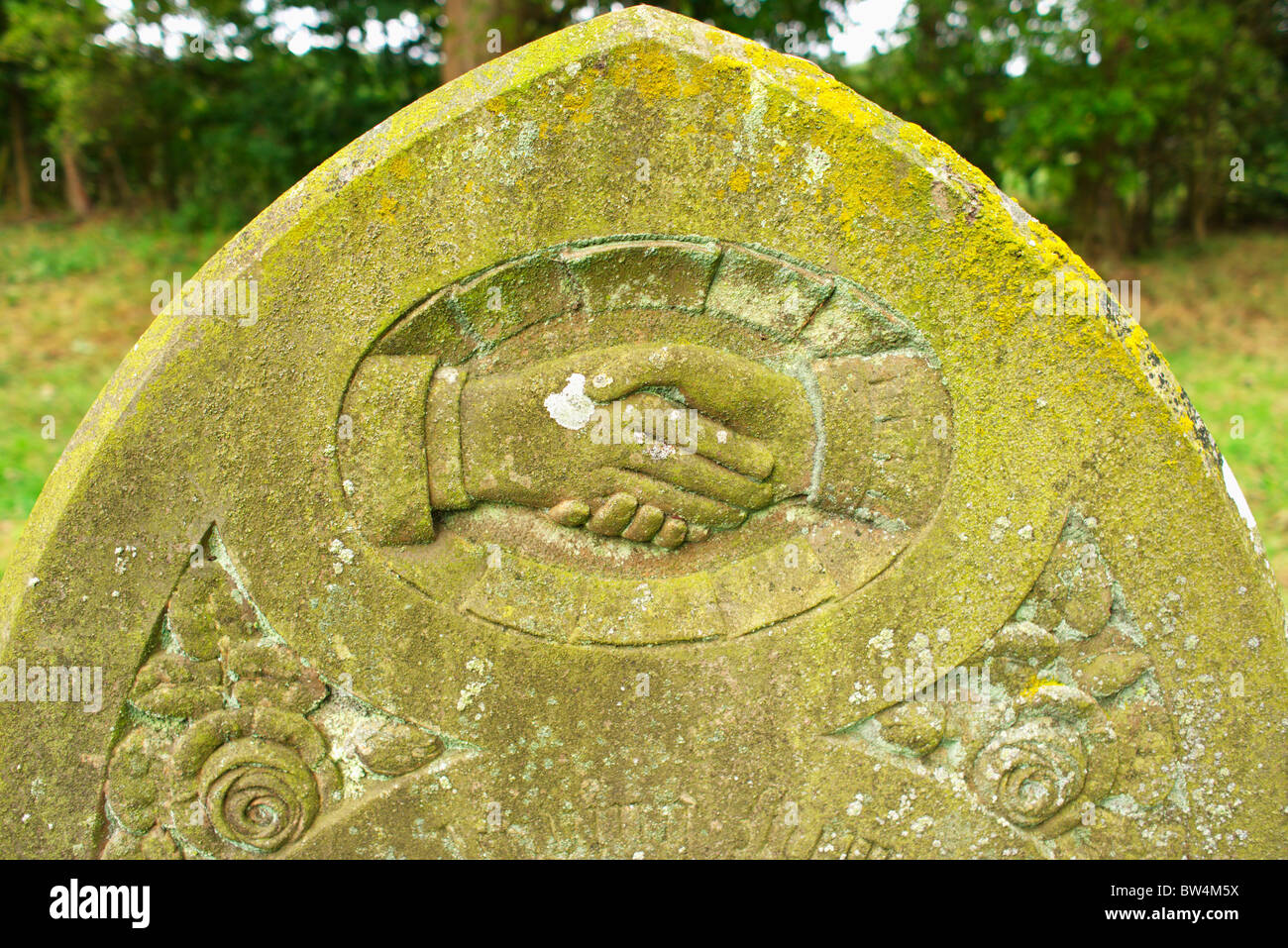gravestones lit by the sun in a country cemetery Stock Photo - Alamy