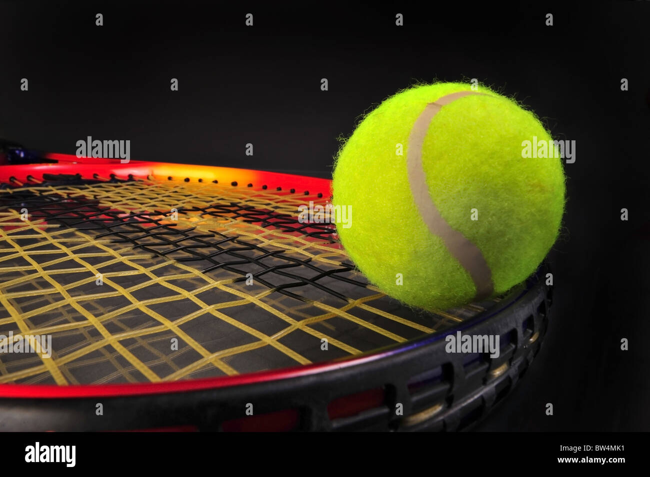 Yellow Tennis ball and Racket Stock Photo - Alamy