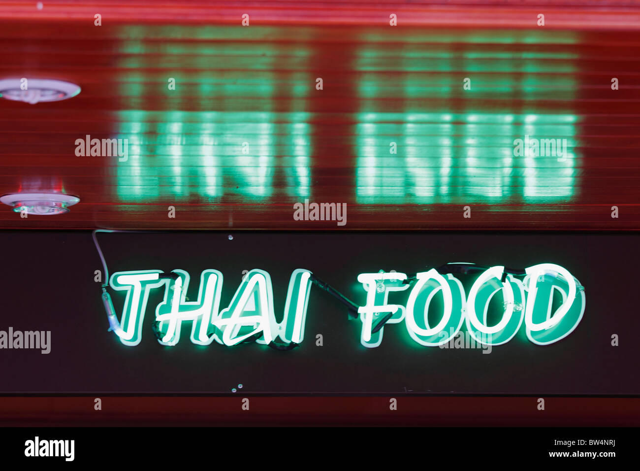 Thai Food neon signboard of a restaurant located on the Walking Street ...