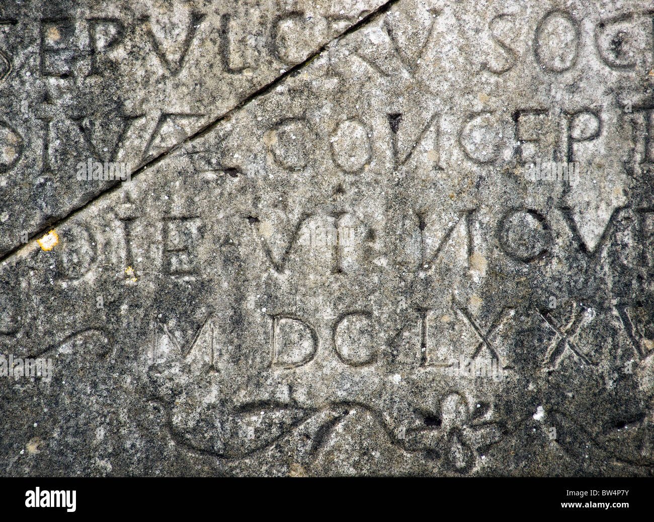 Closeup of antique text engraved on a flagstone Stock Photo - Alamy