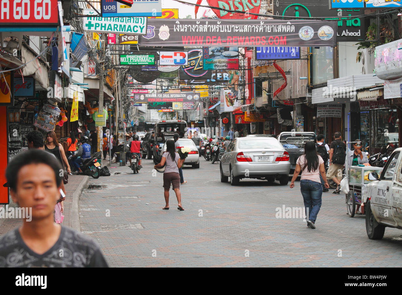 People walking on the main & busy street at daytime. Street scene ...
