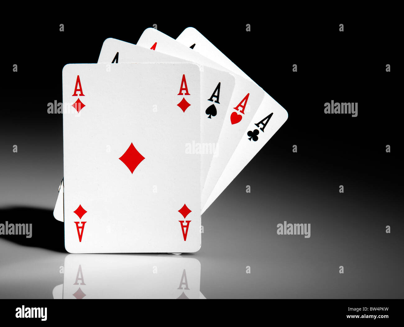 Four aces on isolated background Stock Photo - Alamy